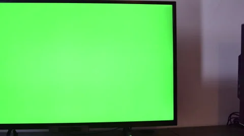 Pan Over A TV Set With Green Screen | Stock Video | Pond5