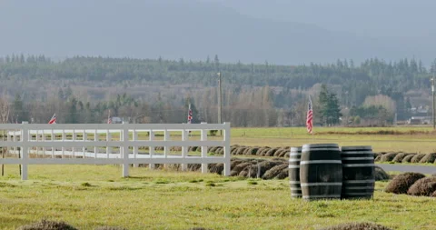 Pan Right Across White Fence With Barrel... | Stock Video | Pond5