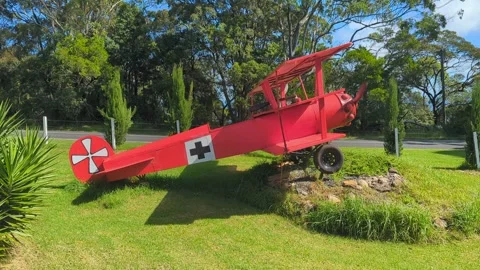 Pan right, Red Baron war plane replica i... | Stock Video | Pond5