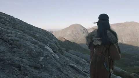 Pan right shot of Native Americans looki... | Stock Video | Pond5