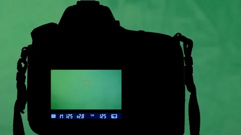 pan on screen spy dslr camera watch on g... | Stock Video | Pond5