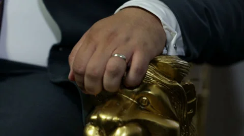 Pan shot of posh dressed man sitting on ... | Stock Video | Pond5