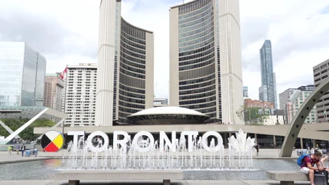 Pan up from Toronto sign to City Hall Bu... | Stock Video | Pond5