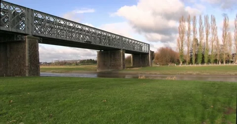 Pan View of a metal bridge and river, th... | Stock Video | Pond5