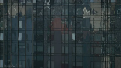 Pan Up View Of Reflective Window Panes O... | Stock Video | Pond5