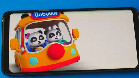 The Panda school bus game is launched on... | Stock Video | Pond5