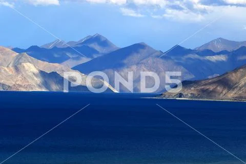 Pangong Tso lake with the mountain ranges in the background, in Ladakh ...