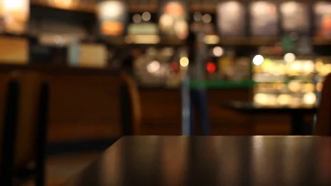 panning camera on the table at cafe blur... | Stock Video | Pond5