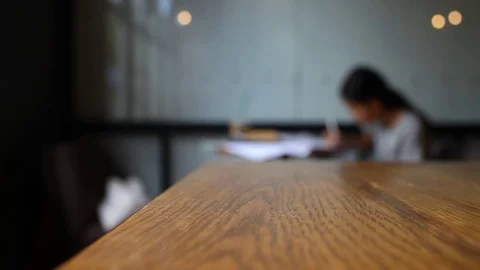 panning camera on the table at cafe blur... | Stock Video | Pond5