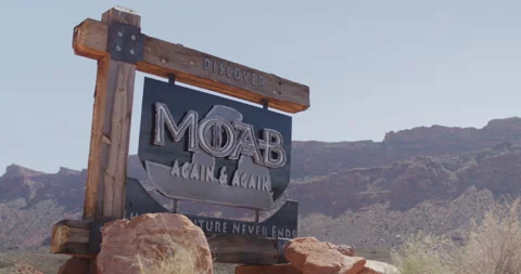 Panning on discover Moab sign in Utah wi... | Stock Video | Pond5