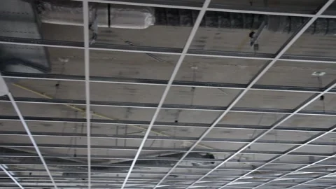Panning over bare suspended ceiling fram... | Stock Video | Pond5
