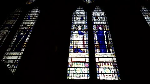 Panning shot of stained glass windows wi... | Stock Video | Pond5