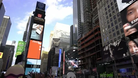 Panning up from Times square to surround... | Stock Video | Pond5