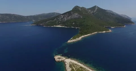 Panoramic view of island. Boat in the ba... | Stock Video | Pond5