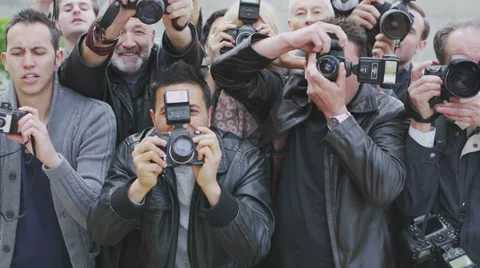 Paparazzi pack fighting to get the best ... | Stock Video | Pond5