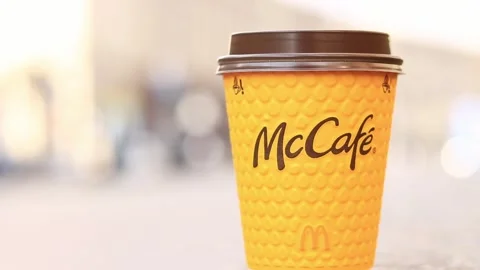 Paper latte cup with McDonald's fast foo... | Stock Video | Pond5