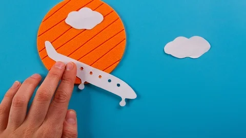 Paper plane landing on blue background. | Stock Video | Pond5