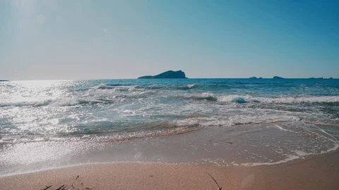 Paradise Beach Reflecting the Sun Rays | Stock Video | Pond5