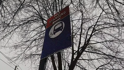 Parallax Shot Of A No Standing Bus Sign ... | Stock Video | Pond5