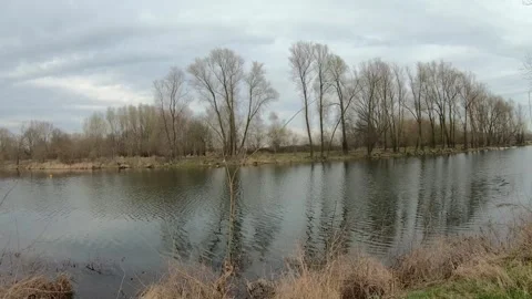 Parallel motion shot along the river, ba... | Stock Video | Pond5
