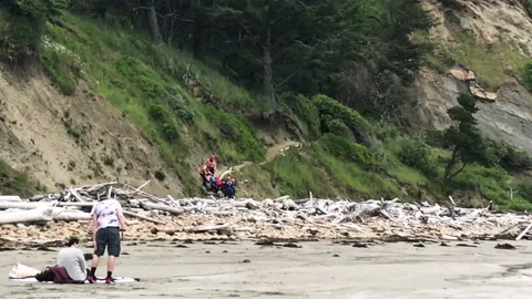 Paramedics carry a wheeled gurney down t... | Stock Video | Pond5