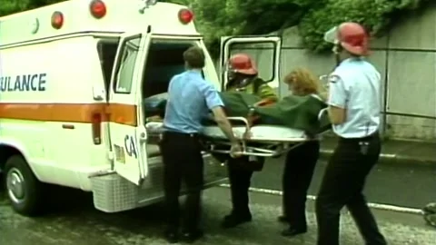PARAMEDICS LOADING VICTIM INTO THE BACK ... | Stock Video | Pond5