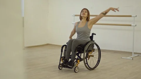 Paraplegic Woman in Wheelchair Learning ... | Stock Video | Pond5