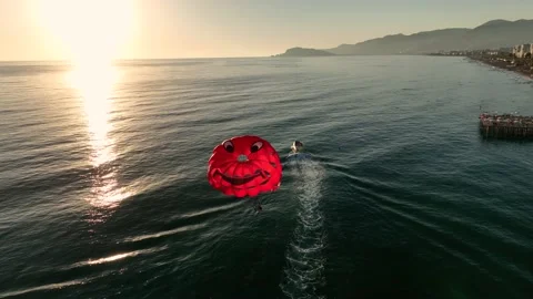 Parasailing over the sea at the most bea... | Stock Video | Pond5