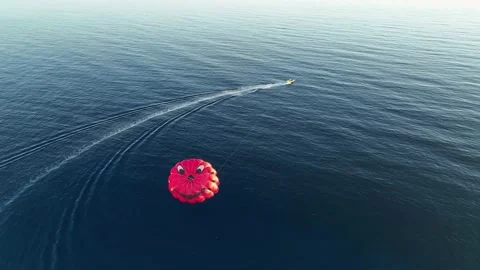 Parasailing over the sea at the most bea... | Stock Video | Pond5