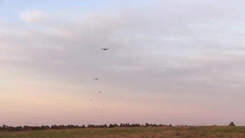 Paratroopers perform static-line jump at... | Stock Video | Pond5