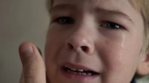 Parent's Hand Wipes Away Tears Comforts ... | Stock Video | Pond5