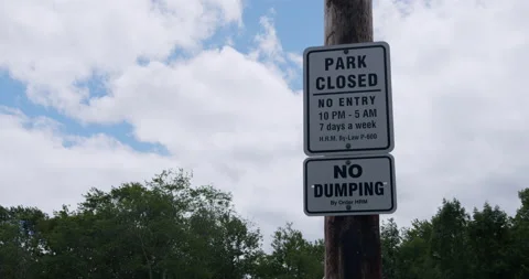 Park closed sign at Kearney Lake beach | Stock Video | Pond5