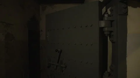 A partially open heavy metal door reinfo... | Stock Video | Pond5