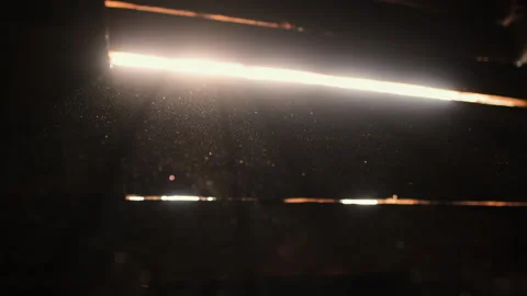 Particles of dust in a light ray from th... | Stock Video | Pond5