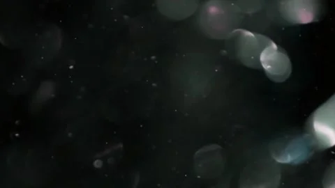 Particles floating in the air with matte... | Stock Video | Pond5