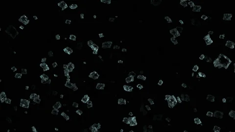 Particles of ice falling down on a black... | Stock Video | Pond5