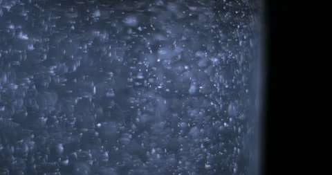 Particles in water background | Stock Video | Pond5