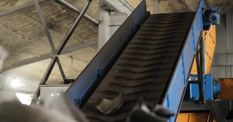 Parts of rubber car tyres moving on conv... | Stock Video | Pond5