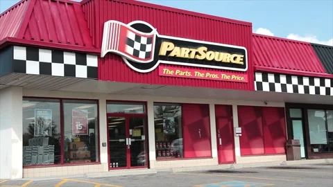 partsource the parts the pros the price sign logo on front of store with checker