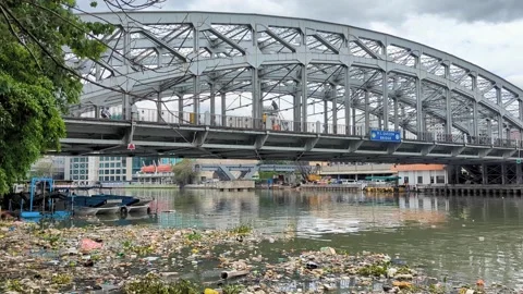 Pasig River plastic trash pollution floa... | Stock Video | Pond5
