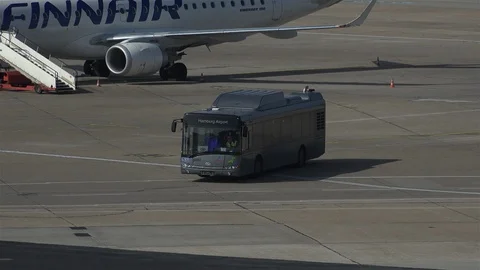 Passenger bus driving on airfield at air... | Stock Video | Pond5