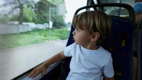 Passenger child sitting inside bus seat ... | Stock Video | Pond5