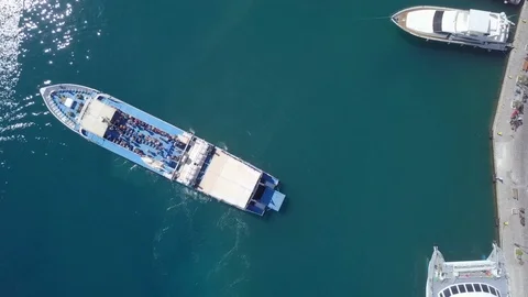 Passenger ferry docking at a Greek islan... | Stock Video | Pond5