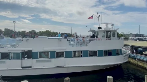 Passenger ferry unloading at the dock in... | Stock Video | Pond5