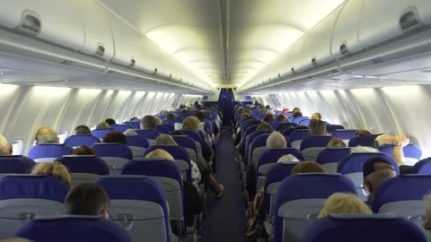 A passenger plane full of unrecognizable... | Stock Video | Pond5
