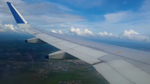 Passenger View of airplane Wing flying b... | Stock Video | Pond5