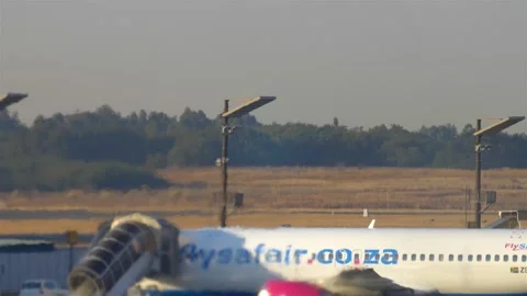 Passengers embarking on flight With Heat... | Stock Video | Pond5