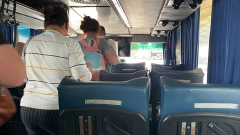 Passengers getting off the intercity bus... | Stock Video | Pond5