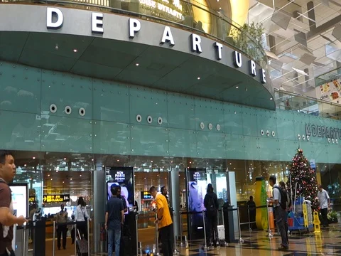 Passengers leave via departure hall in T... | Stock Video | Pond5