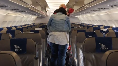 Passengers leave the plane. Salon of a p... | Stock Video | Pond5